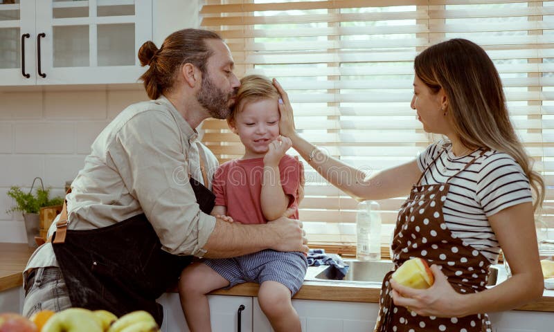 Happy Family Eating Fruits in the Kitchen Stock Image - Image of ...