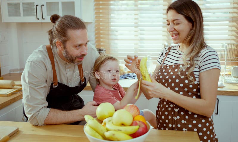 Happy Family Eating Fruits in the Kitchen Stock Image - Image of love ...