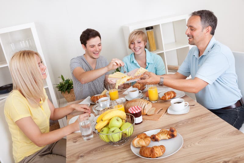 Happy Family Enjoying Breakfast Stock Image - Image of culinary ...