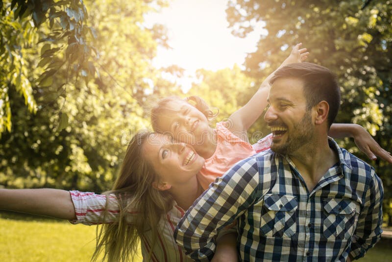 Happy Family Enjoying Together in Summer Day. Family in Nature Stock ... Happy Family Enjoying Together in Summer Day. Family in Nature Stock ...