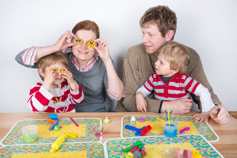 Happy Family of a Four Having Fun at Home Stock Image - Image of game ...