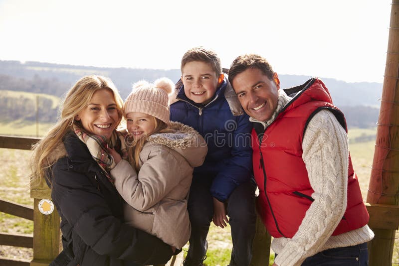 Happy Family by a Gate in the Countryside, Close Up Stock Image - Image ...