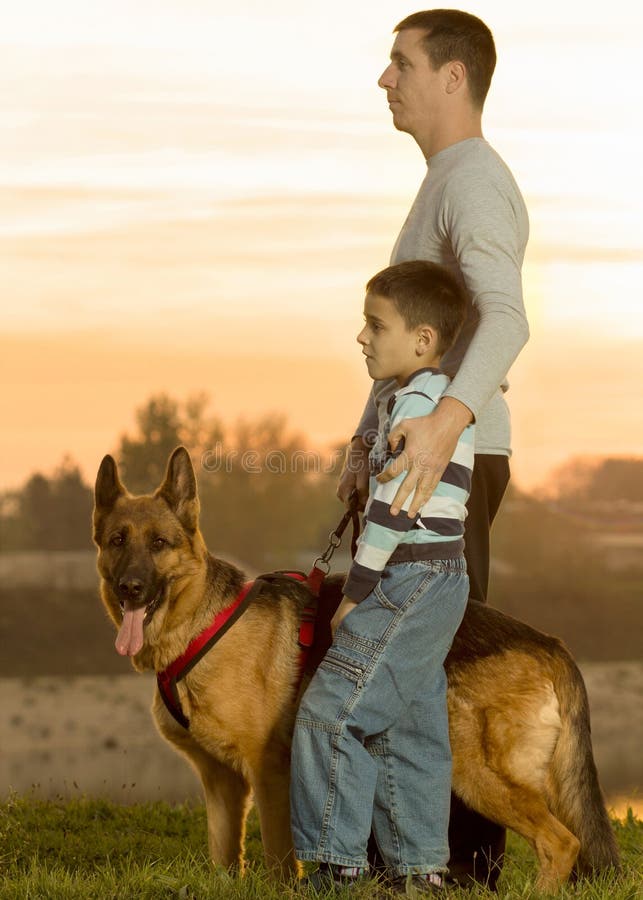 Happy Family and German Shepherd in Sunset Stock Image - Image of ...
