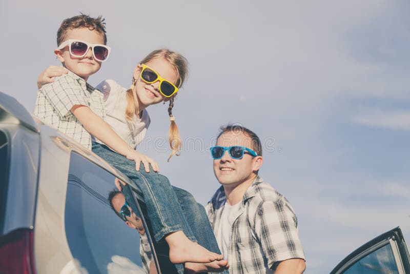 Happy Family Getting Ready for Road Trip on a Sunny Day Stock Image ...