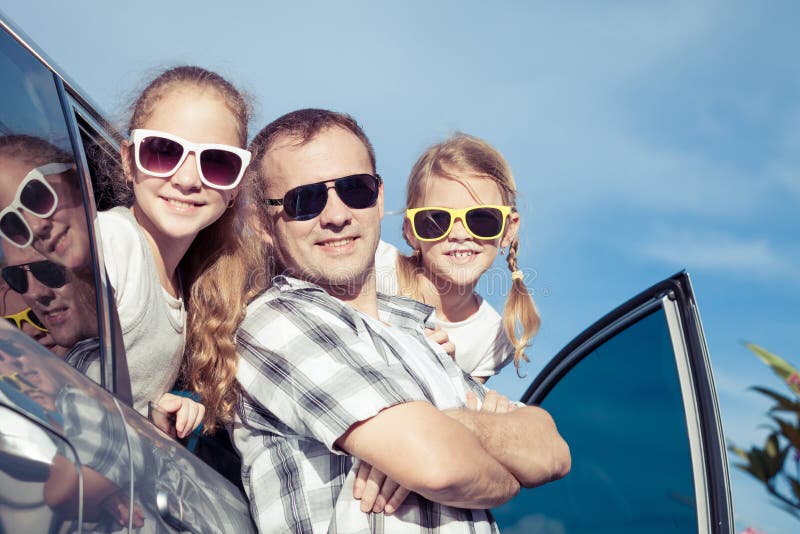 Happy Family Getting Ready for Road Trip on a Sunny Day Stock Photo ...