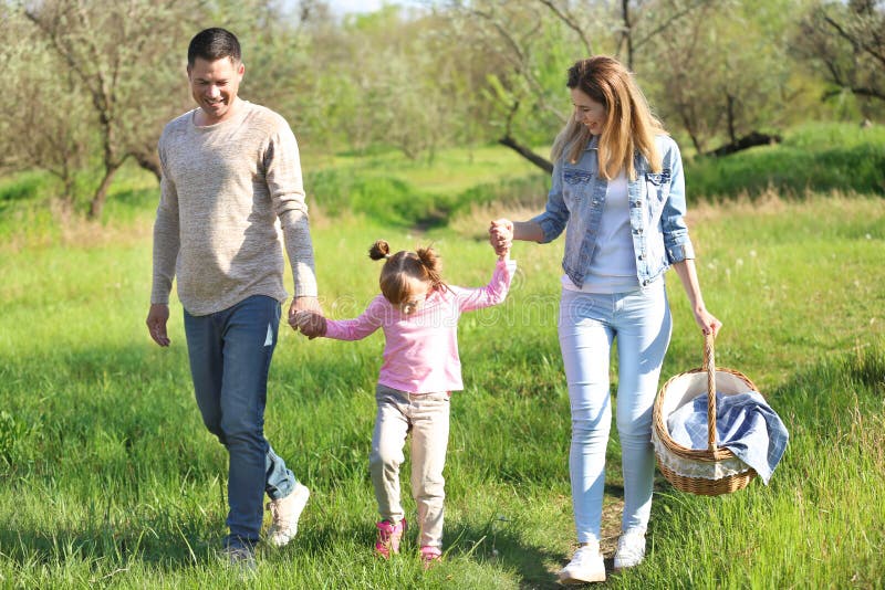 Happy Family Going on Picnic in Park Stock Photo - Image of husband ... Happy Family Going on Picnic in Park Stock Photo - Image of husband ...