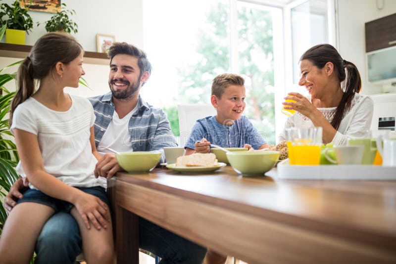 Happy Family Having Breakfast Stock Photo - Image of breakfast, girl ...
