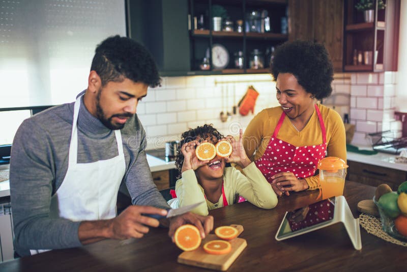 Happy Family Having Breakfast in the Kitchen, Having Fun Stock Image ...