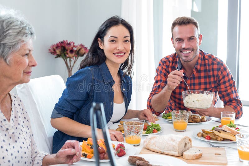 Happy Family Having Breakfast Stock Photo - Image of fruit, abode: 68292792