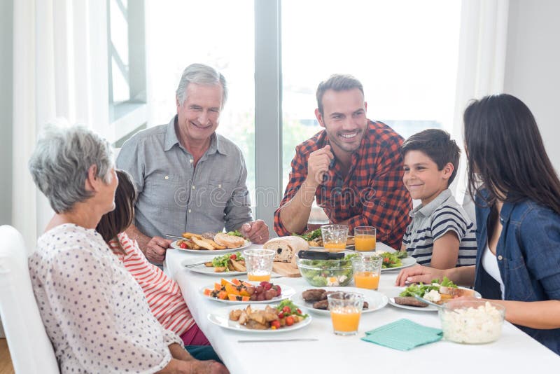 Happy Family Having Breakfast Stock Photo - Image of domestic, adult ...