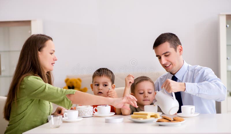 Happy Family Having Breakfast Together at Home Stock Image - Image of ...
