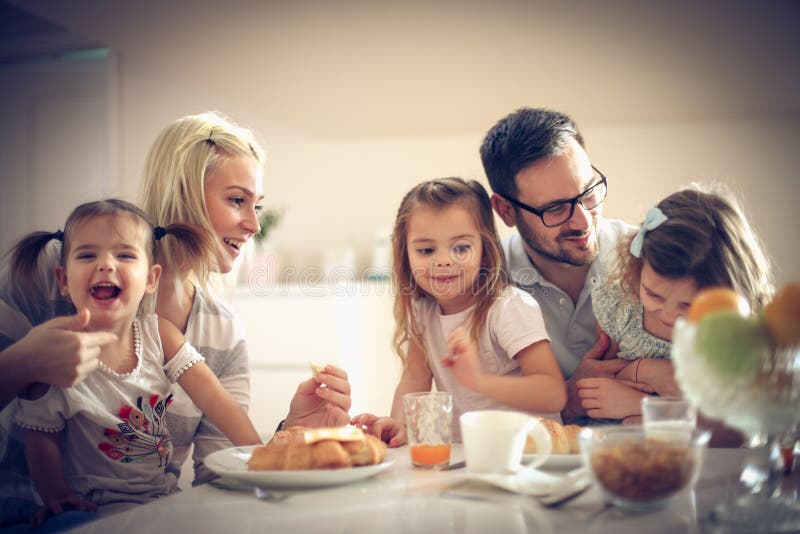 Happy Family Having Breakfast. Stock Photo - Image of child, bonding ...