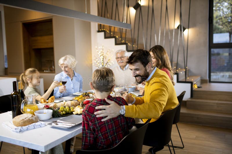 Happy Family Having Dinner with Red Wine at Home Stock Image - Image of ...