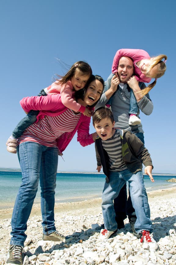 Happy family having fun stock photo. Image of outdoors - 19382876