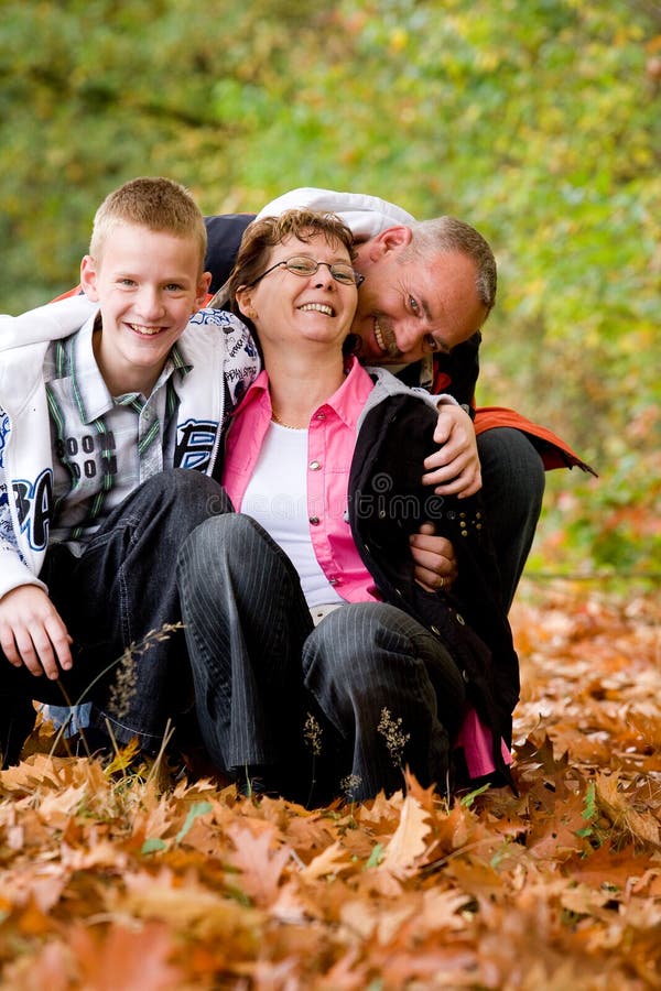 Happy Family is Having Fun in the Autumn Stock Photo - Image of mother ...