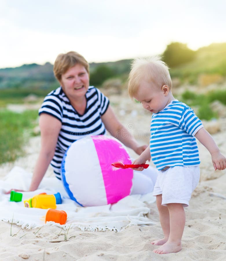Happy Family Having Fun at the Beach Stock Image - Image of happy ...