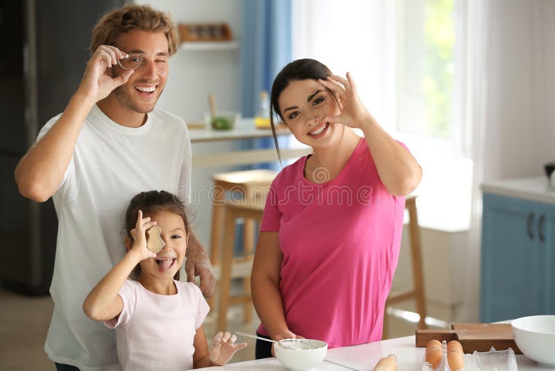Happy Family Having Fun while Cooking in Kitchen Stock Photo - Image of ...