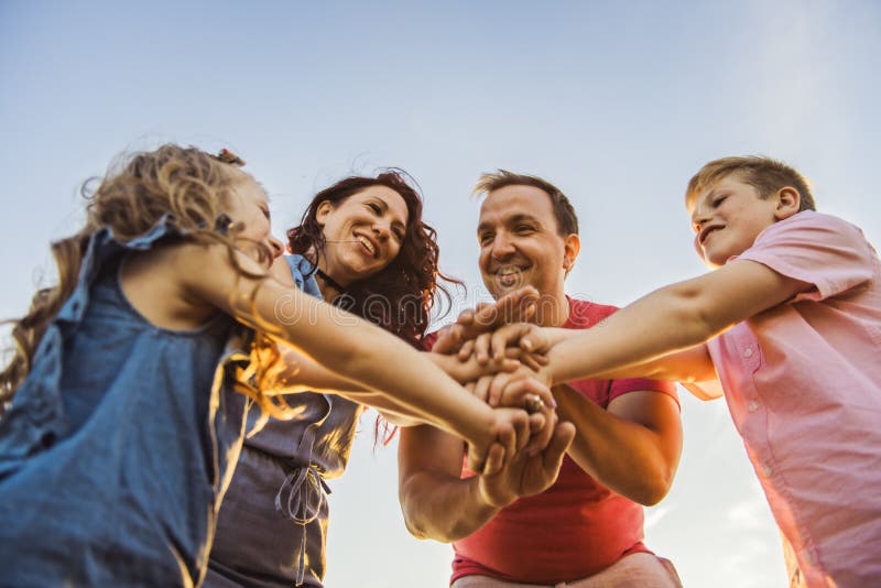 Happy Family Having Fun on Daisy Field at Sunset Stock Image - Image of ...