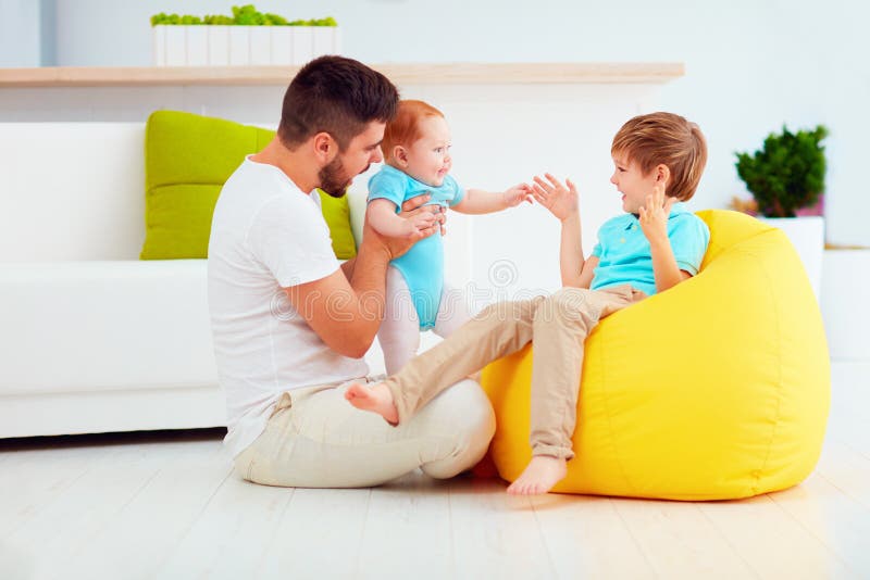 Happy Family Having Fun at Home. Boys Band : Stock Image - Image of ...