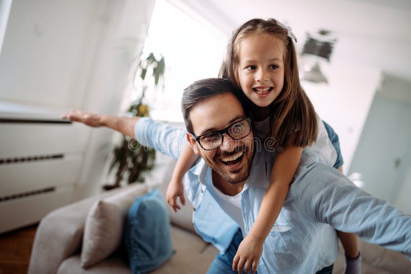 Happy Family Having Fun Time at Home Stock Photo - Image of adult ...