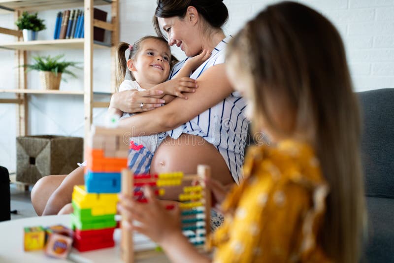Happy Family Having Fun Times at Home Stock Photo - Image of maternity ...