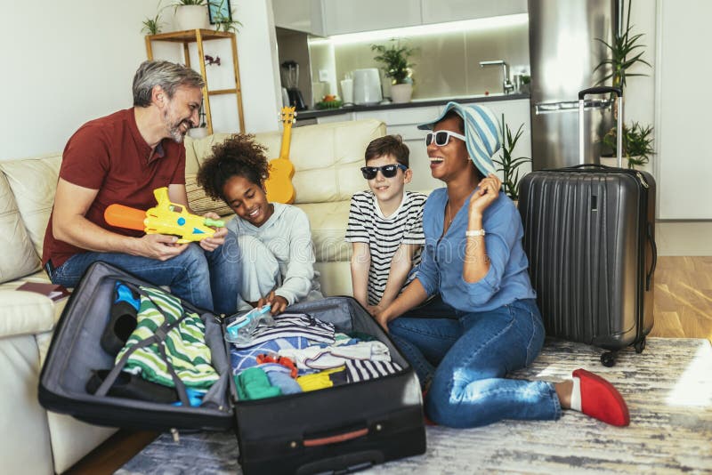 Family Having Great Time and Packing for Summer Holidays Stock Image ...
