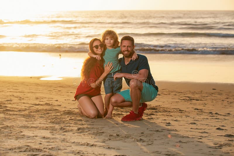 Happy Family Hugging on Beach. Family Outdoors. Stock Photo - Image of ...