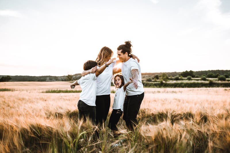 Children hugging a tree stock photo. Image of hands - 116959018