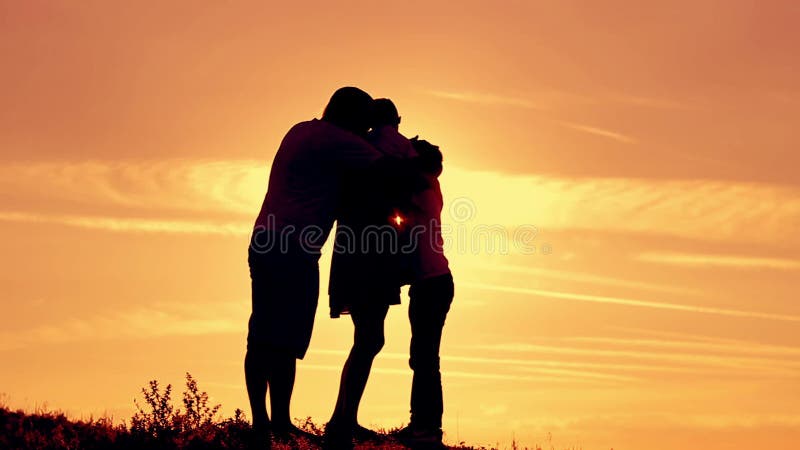 Silhouettes of Happy Family at Sunset. Stock Video - Video of love ...