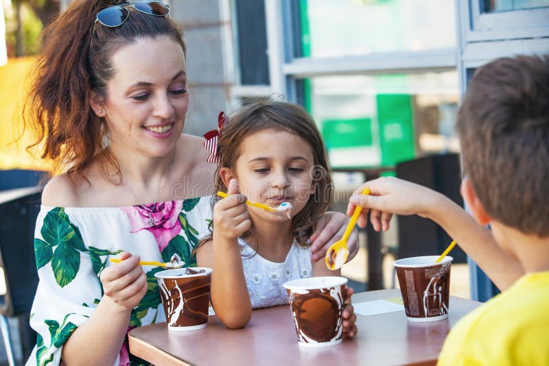 Happy Family at Ice Cream Cafe Stock Image - Image of sister, beautiful ...