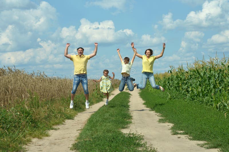 Happy family jumping stock image. Image of corn, funny - 43396835