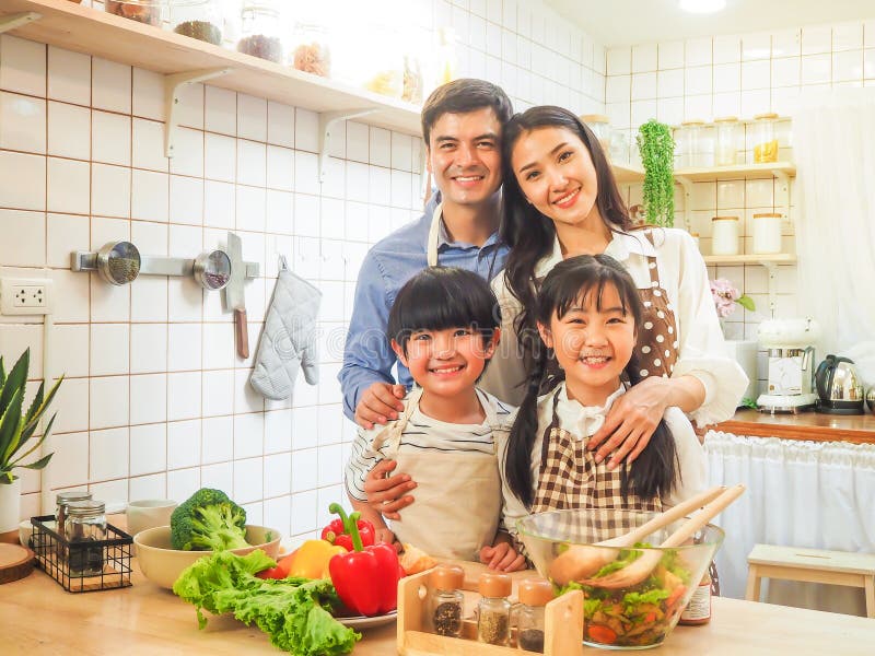 Happy Family is in the Kitchen Stock Photo - Image of father, happy ...
