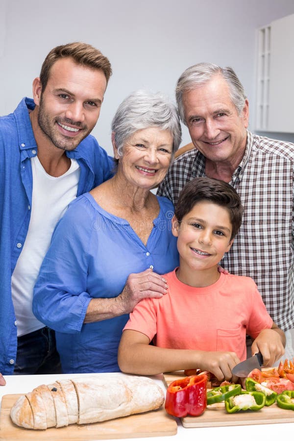 Happy Family in the Kitchen Stock Image - Image of four, domestic: 68292359