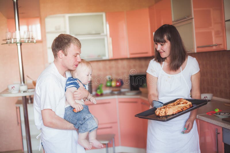 Happy family at kitchen stock image. Image of home, playing - 49896415
