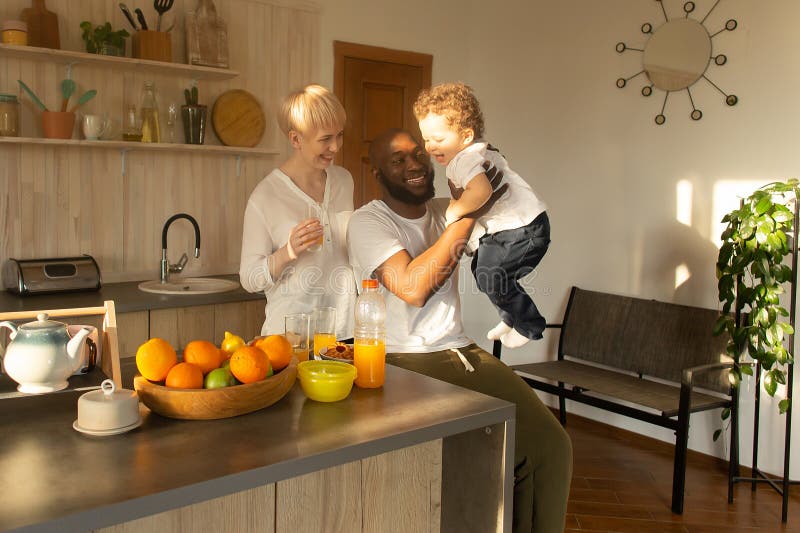 Happy Family in the Kitchen of the House Stock Photo - Image of ...