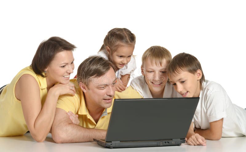 Happy family with laptop stock photo. Image of parents - 56816442