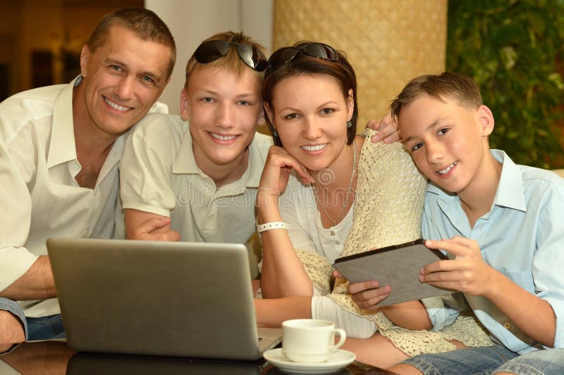 Family with laptop stock photo. Image of lifestyle, beautiful - 20610148