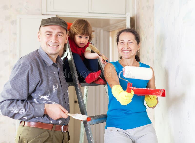 Happy Family Makes Repairs at Home Stock Photo - Image of mother ...