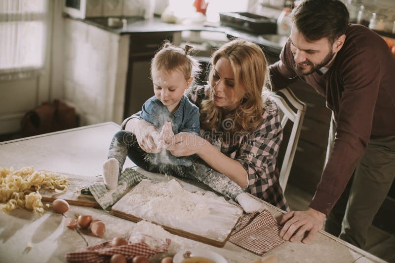 Happy Family Making Pasta in Kitchen at Home Stock Image - Image of ...
