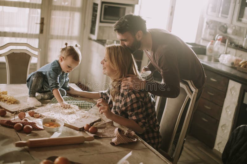 Happy Family Making Pasta in Kitchen at Home Stock Photo - Image of ...