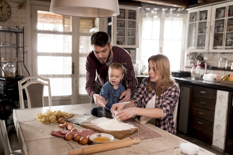 Happy Family Making Pasta in the Kitchen at Home Stock Image - Image of ...