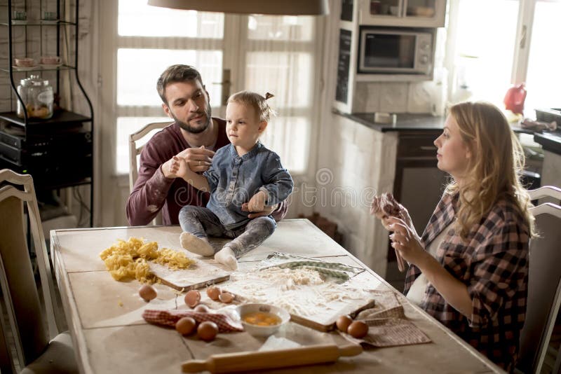 Happy Family Making Pasta in the Kitchen at Home Stock Image - Image of ...