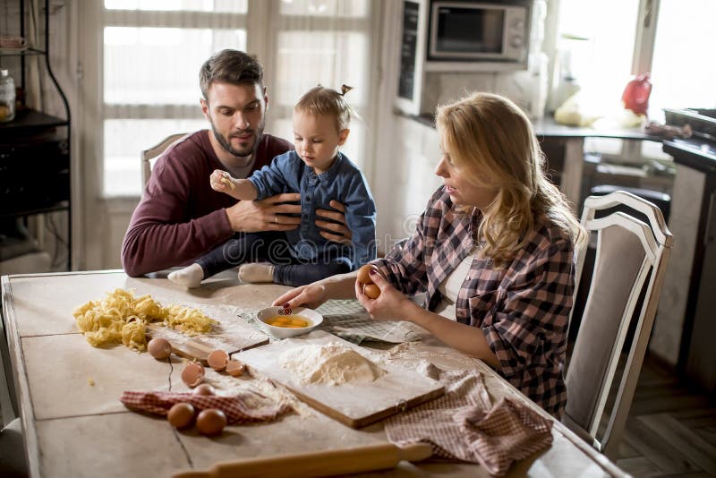 Happy Family Making Pasta in the Kitchen at Home Stock Image - Image of ...