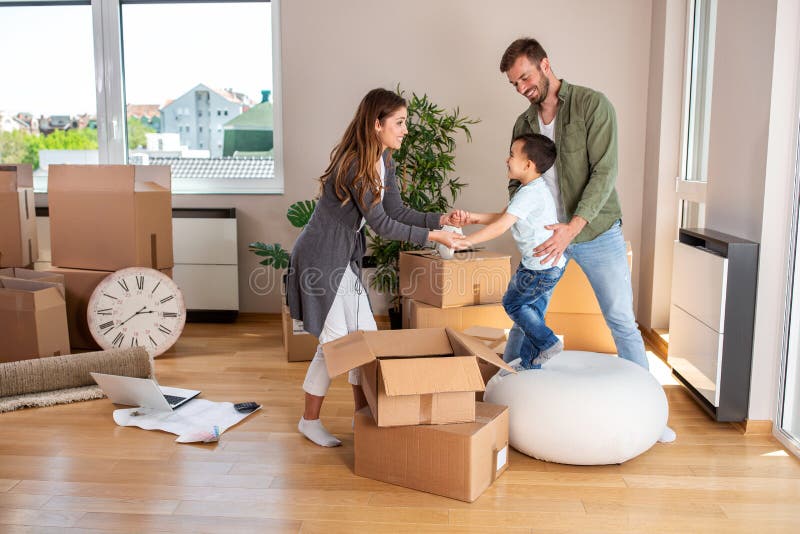 Happy Family Moving in and Having Fun Stock Image - Image of moving ...