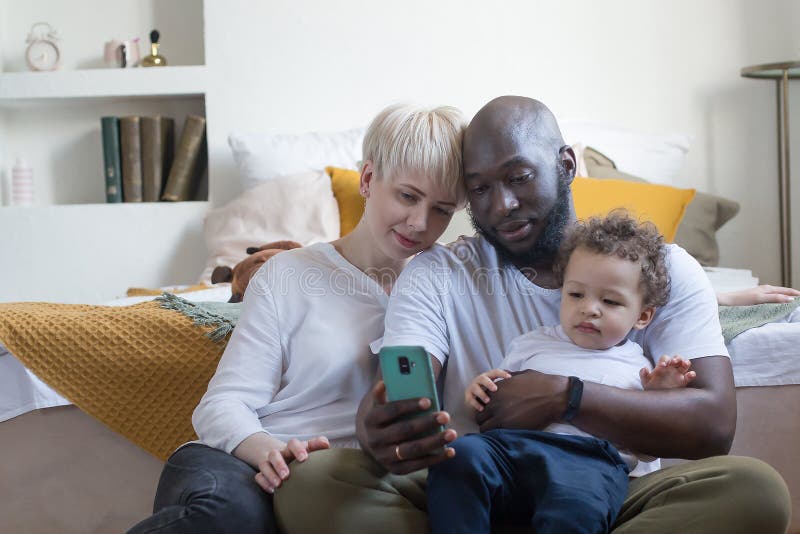 Happy Family Multinational Rest at Home Stock Photo - Image of close ...