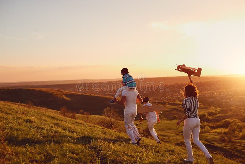 Happy Family in Nature at Sunset. Stock Photo - Image of family ...