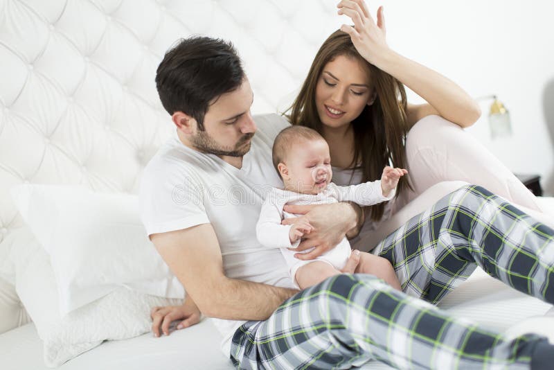 Happy Family with Newborn Baby Stock Photo - Image of daughter ...