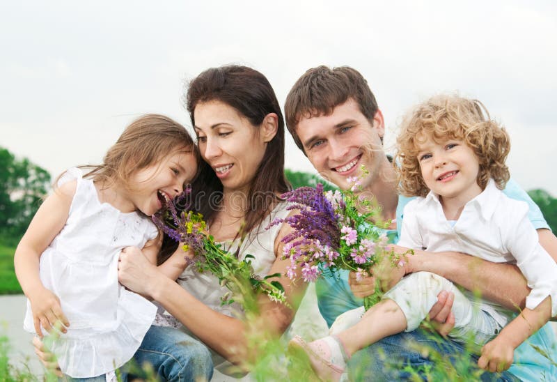 Happy family outdoors stock image. Image of spring, park - 25210363