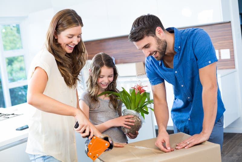 Happy family packing box stock photo. Image of family - 68206712