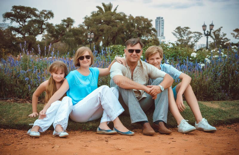 Happy family in park stock image. Image of husband, adult - 97916071